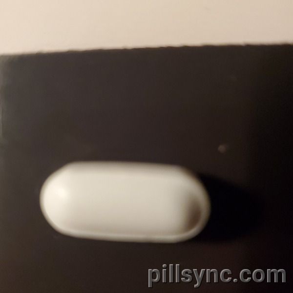 WHITE OVAL V - bismuth subsalicylate tablet film coated Pill Images